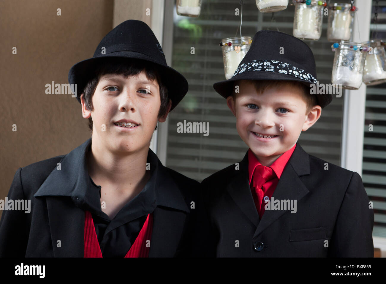 Boys in black hi-res stock photography and images - Alamy