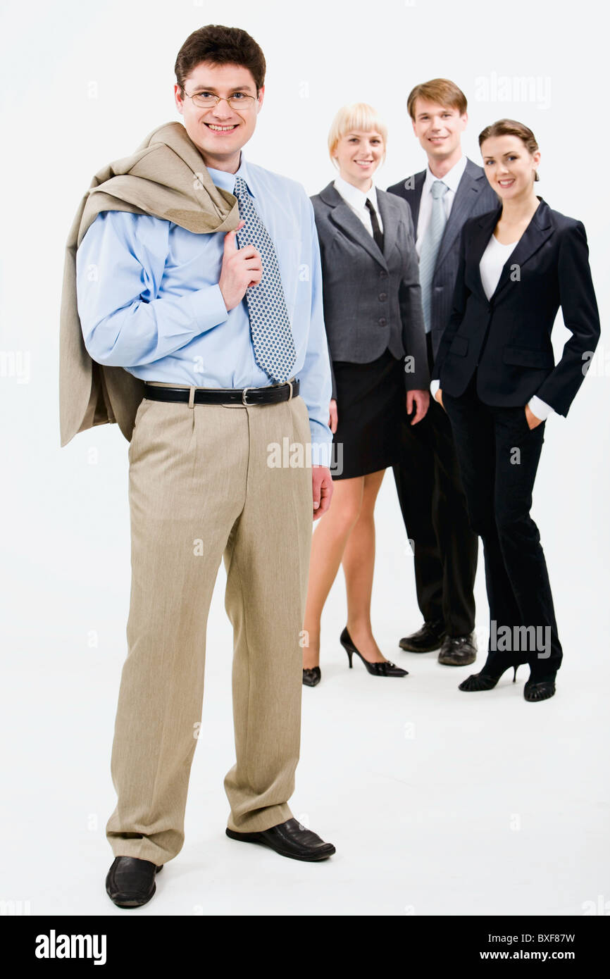 Happy boss is standing with his business team Stock Photo - Alamy