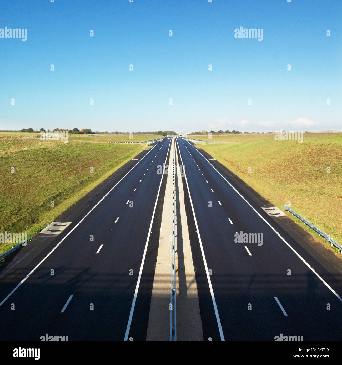 Empty straight dual carriageway UK Stock Photo - Alamy