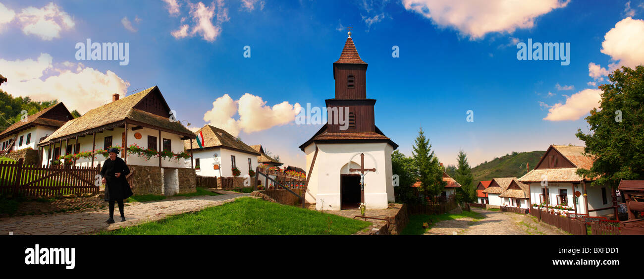 Main Street of Hollókő ( Holoko ) Paloc ethnographic village with women ...