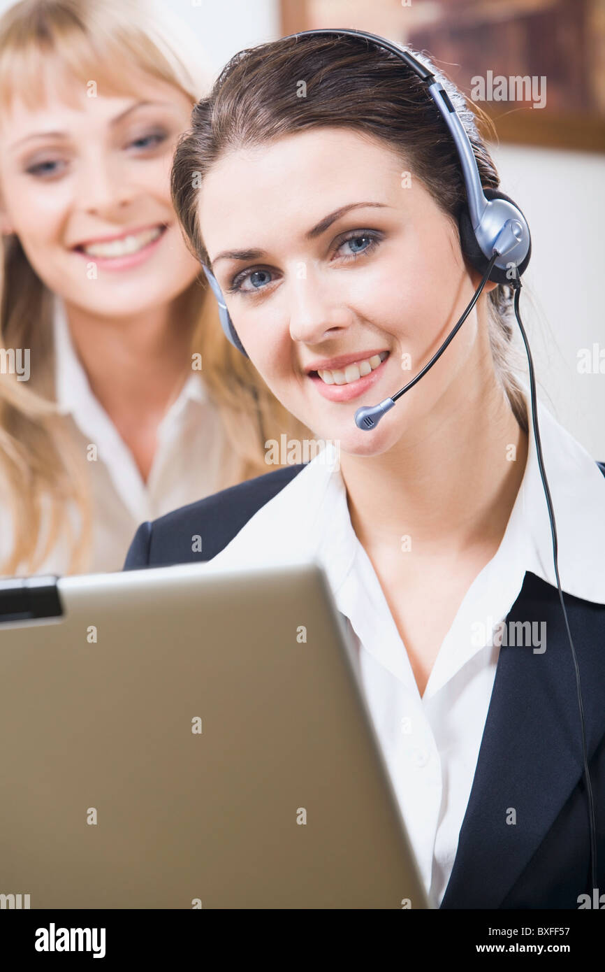 Portrait of friendly customer service operator smiling with charming ...