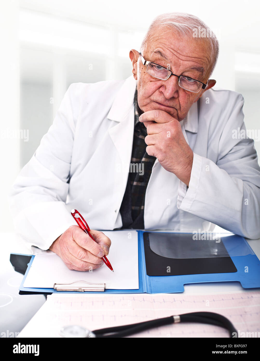 doctor on duty, portrait of senior worker Stock Photo - Alamy