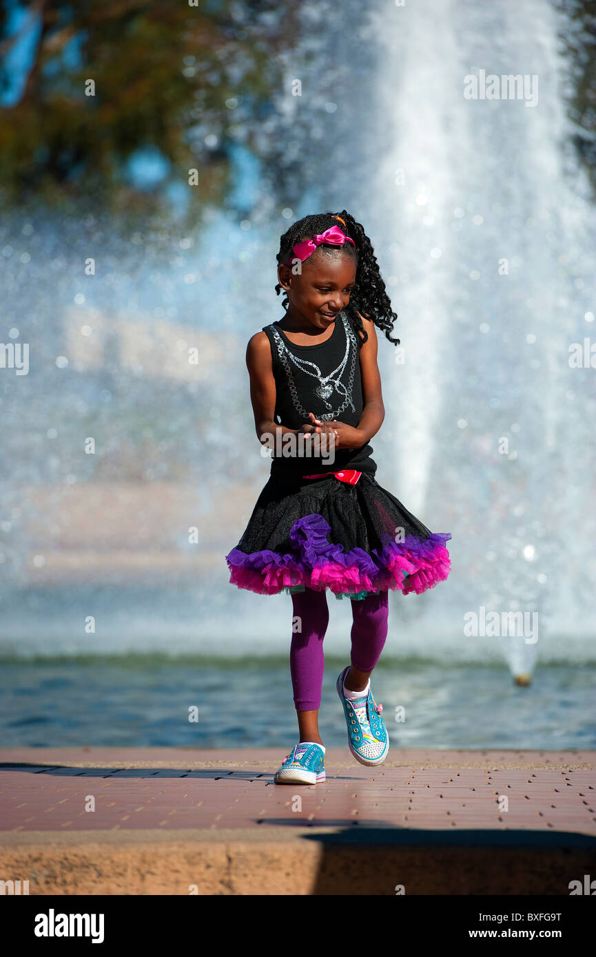 Playing at the Bea Evenson, Memorial Fountain, in Balboa Park, San ...