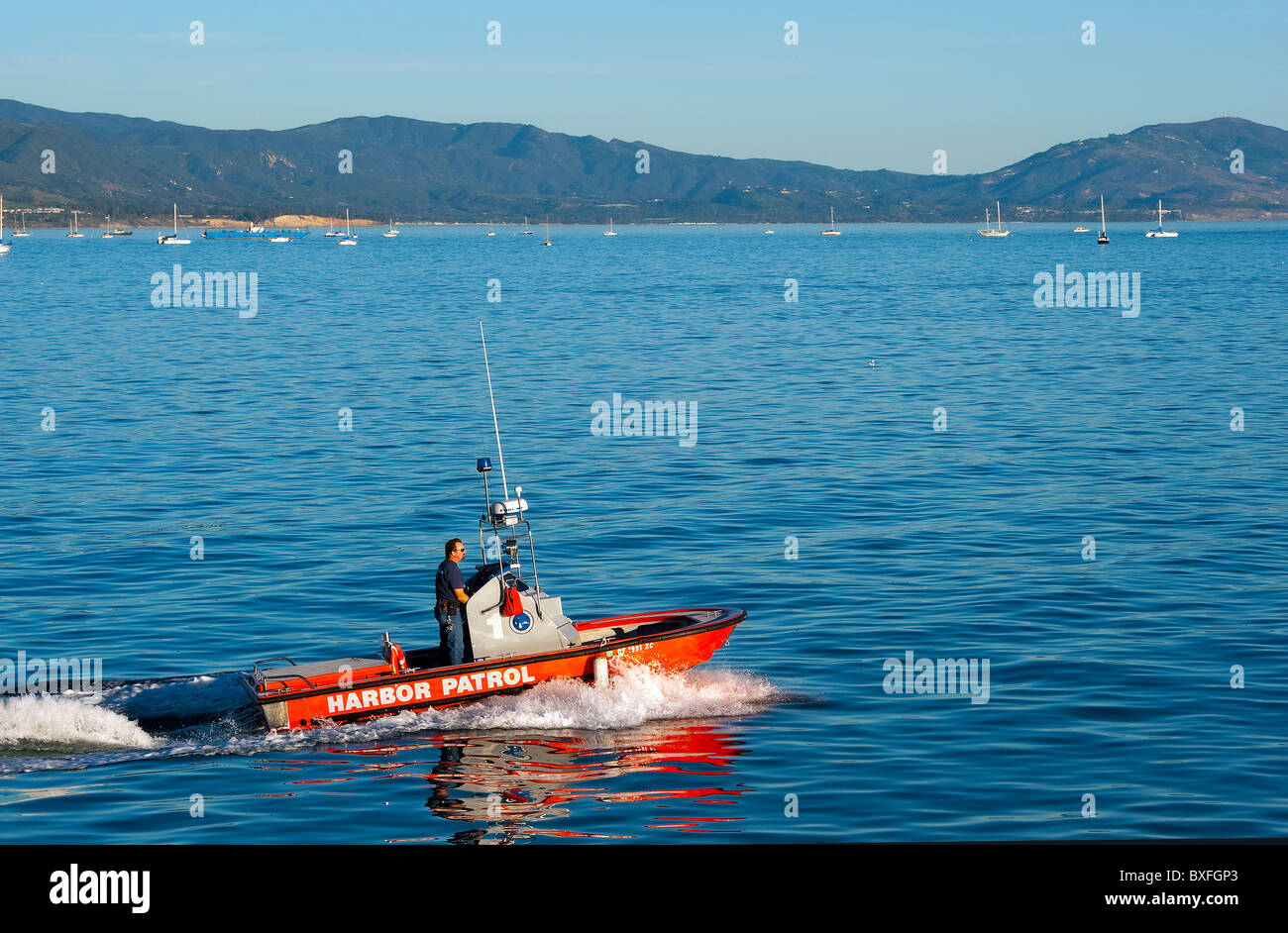 An harbor patrol speed boat on a patrol at east beach, santa barbara ...