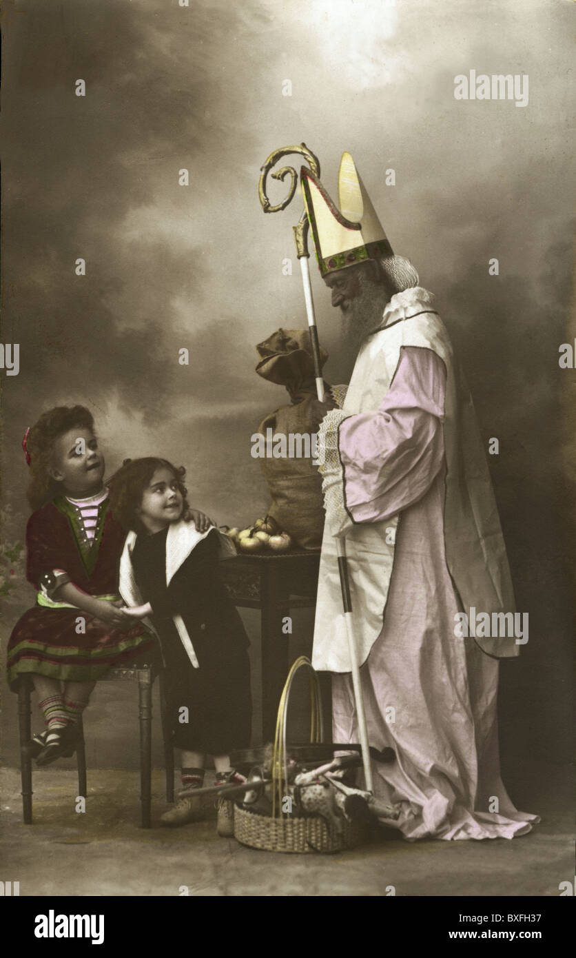 tradition / folklore, Belgium, Santa Claus visiting two little girls ...