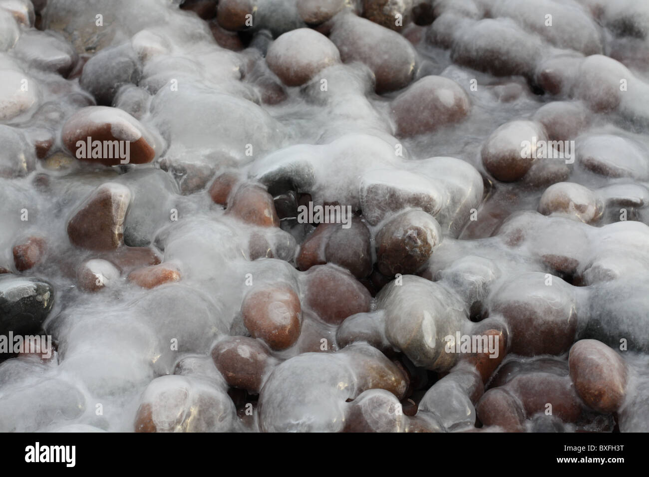 Ice covered rocks at the beach hi-res stock photography and images - Alamy