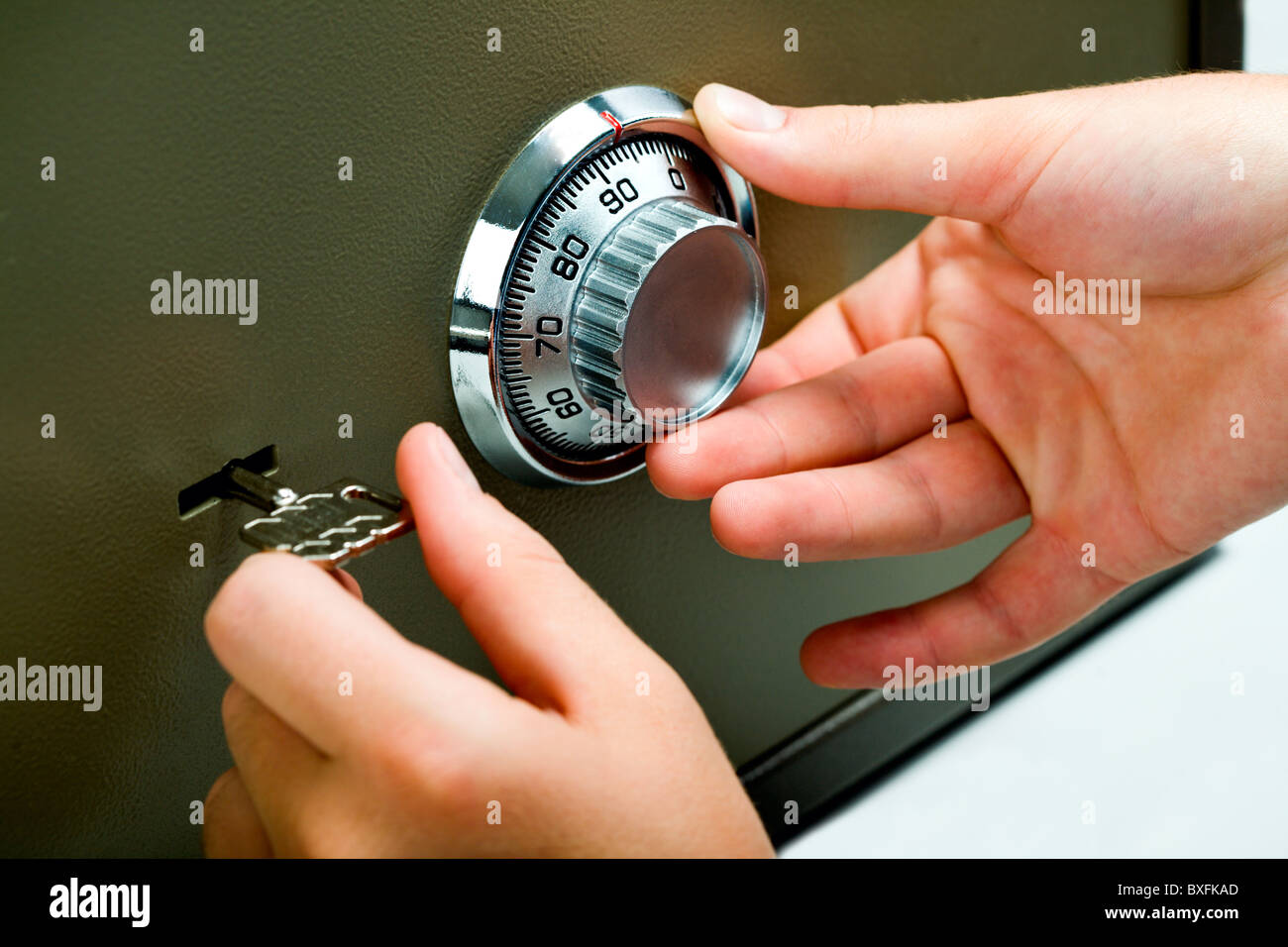 A business man opens his metal safe Stock Photo - Alamy