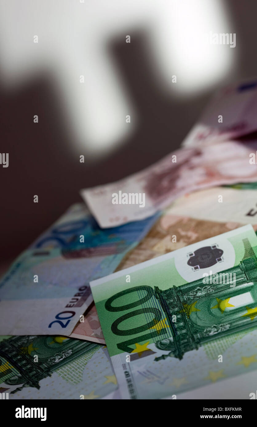 Euro money with a simulated city in the background Stock Photo - Alamy