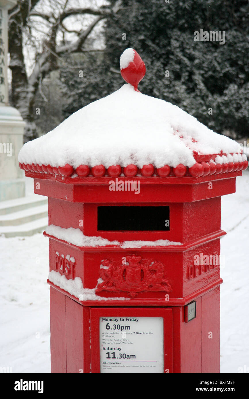 Post box covered in snow Stock Photo - Alamy