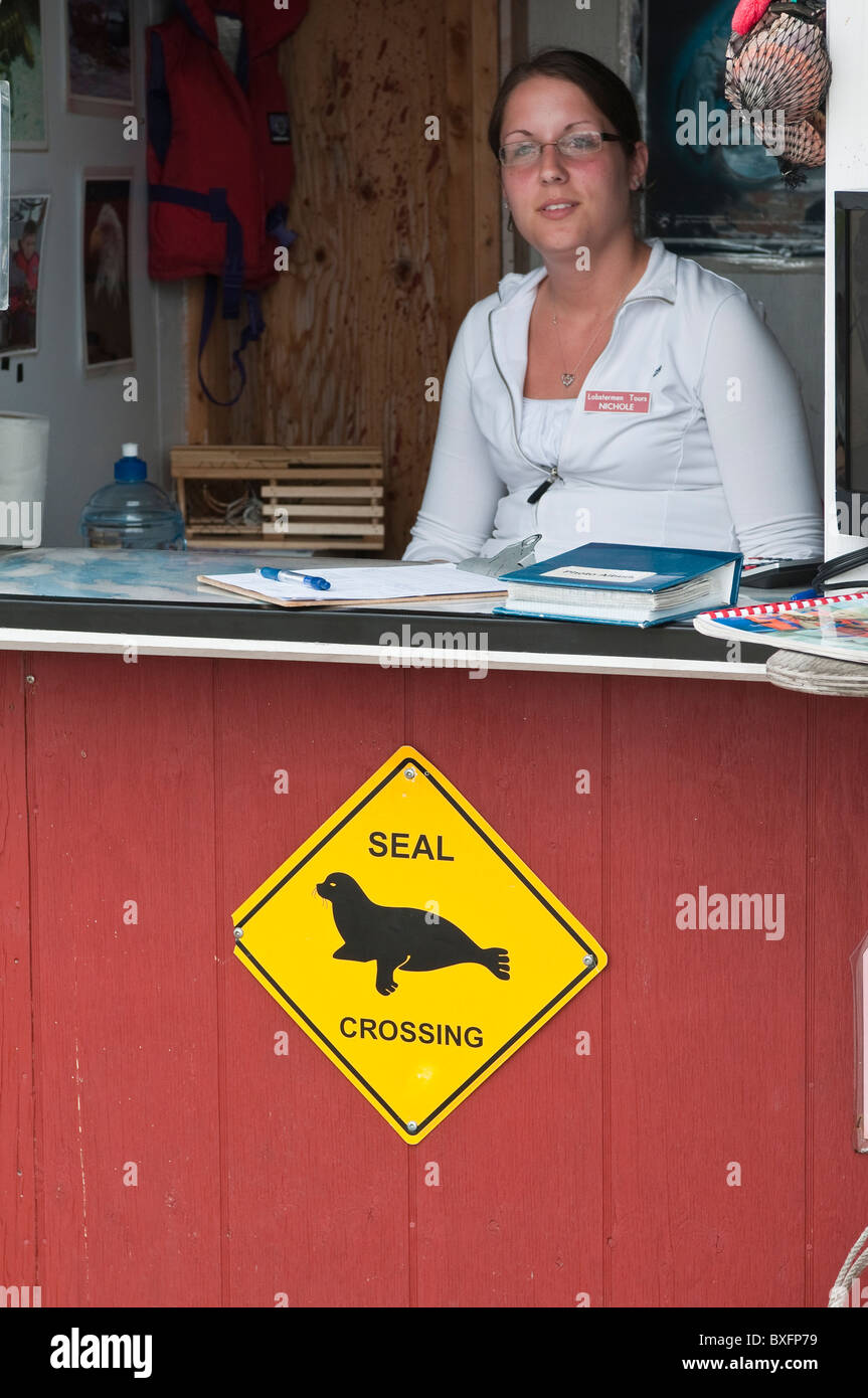 Tour guide operator at desk in Lunenburg, Nova Scotia, Canada Stock ...