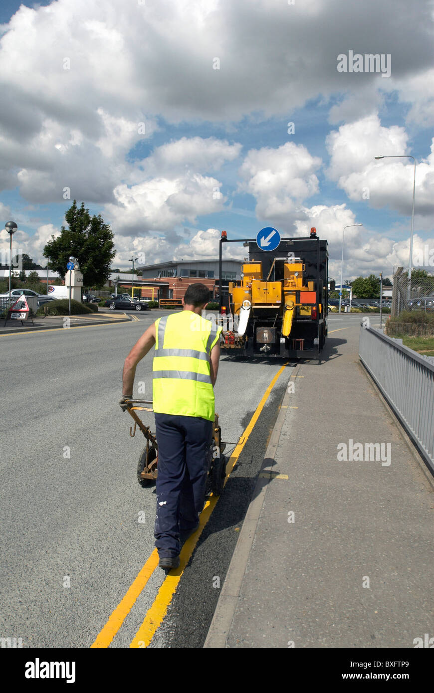 Painting yellow lines road hi-res stock photography and images - Alamy