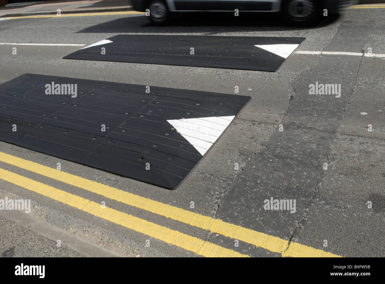 Speed humps hi-res stock photography and images - Alamy