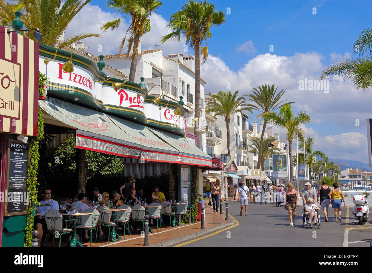 Luxury shops at the exclusive yacht harbour of Puerto Banús, Marbella ...