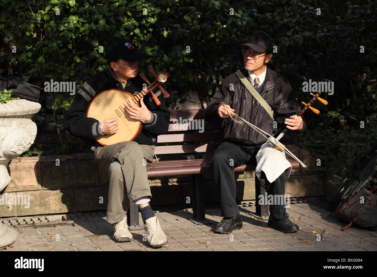 Musicians playing traditional instruments hi-res stock photography and ...