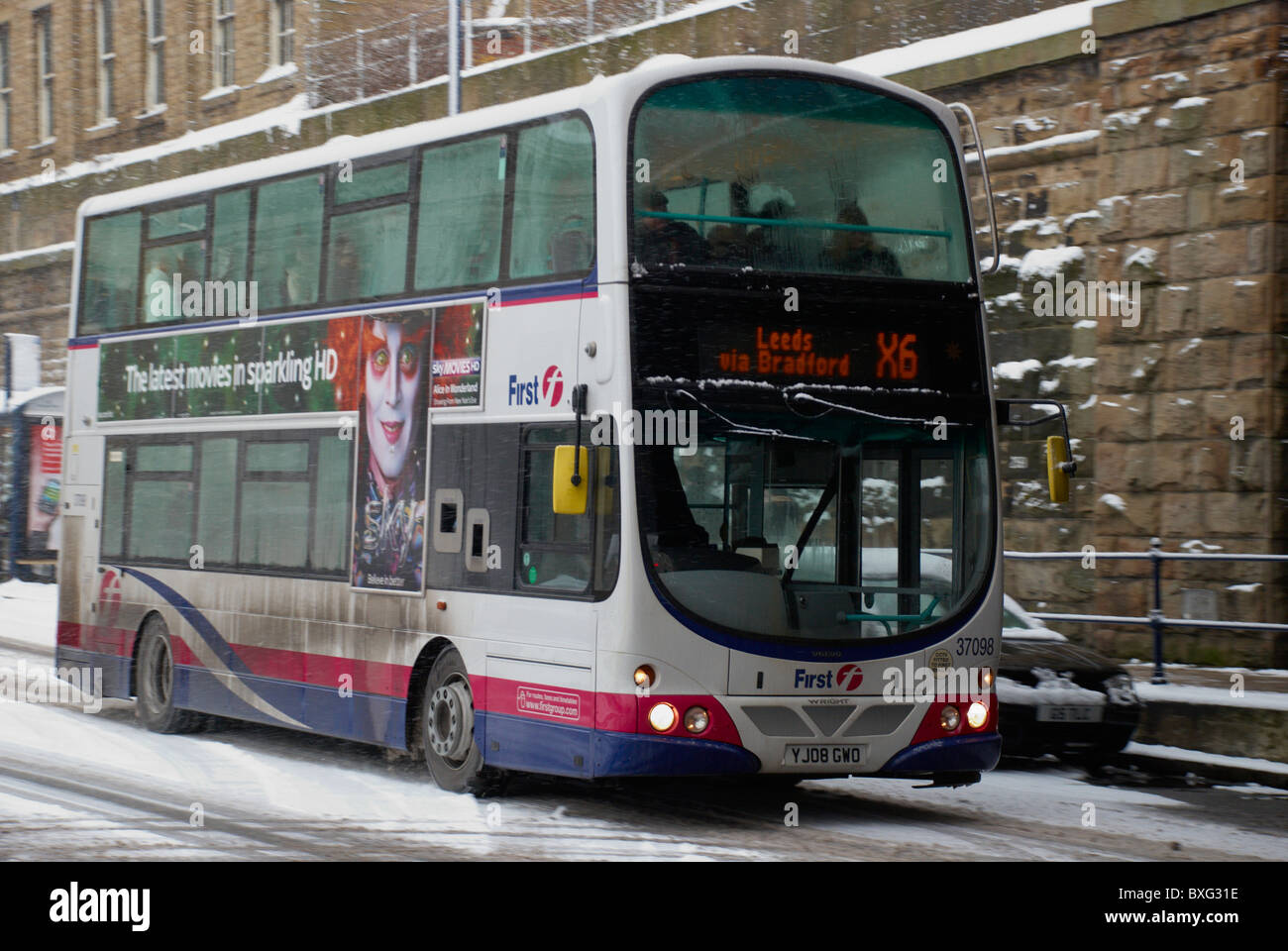 Bus driving in the snow hi-res stock photography and images - Alamy