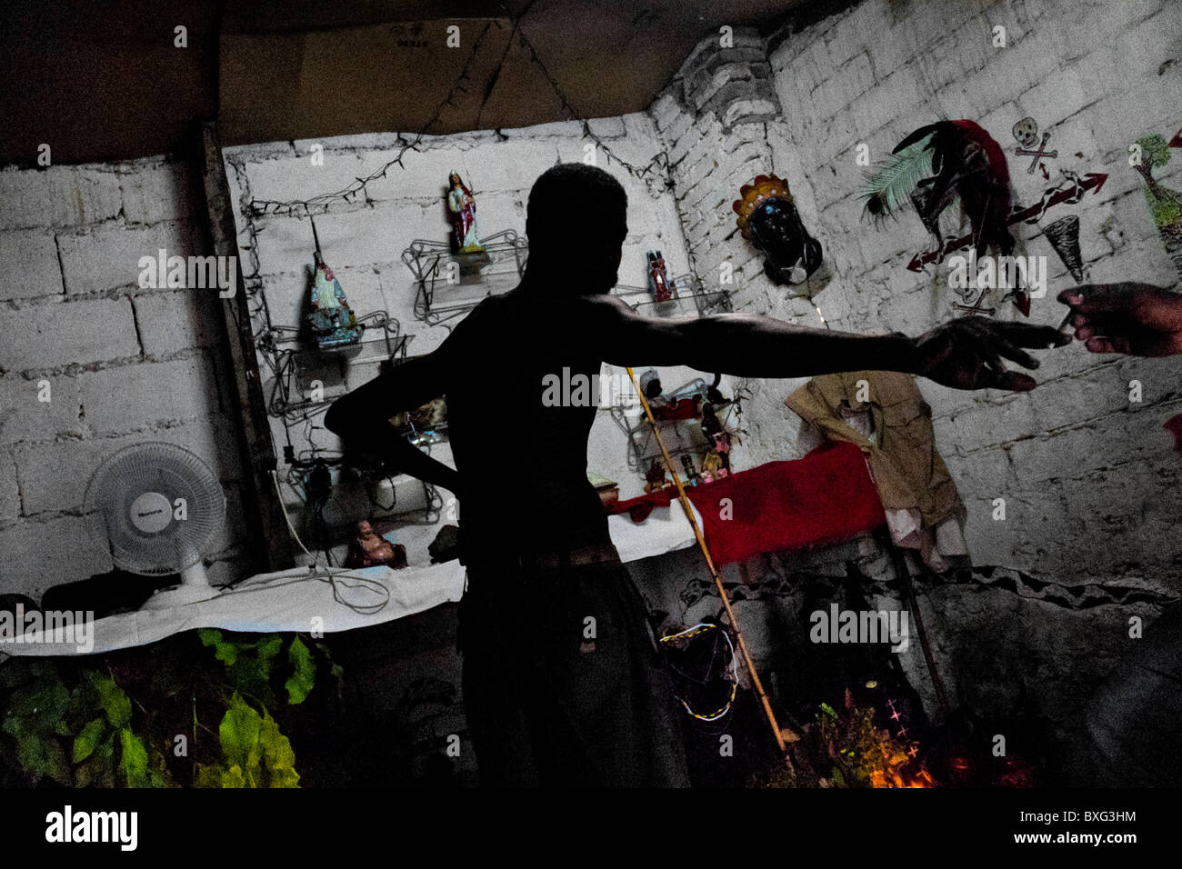 A Cuban man prepares the Palo religious ritual in the home temple in ...
