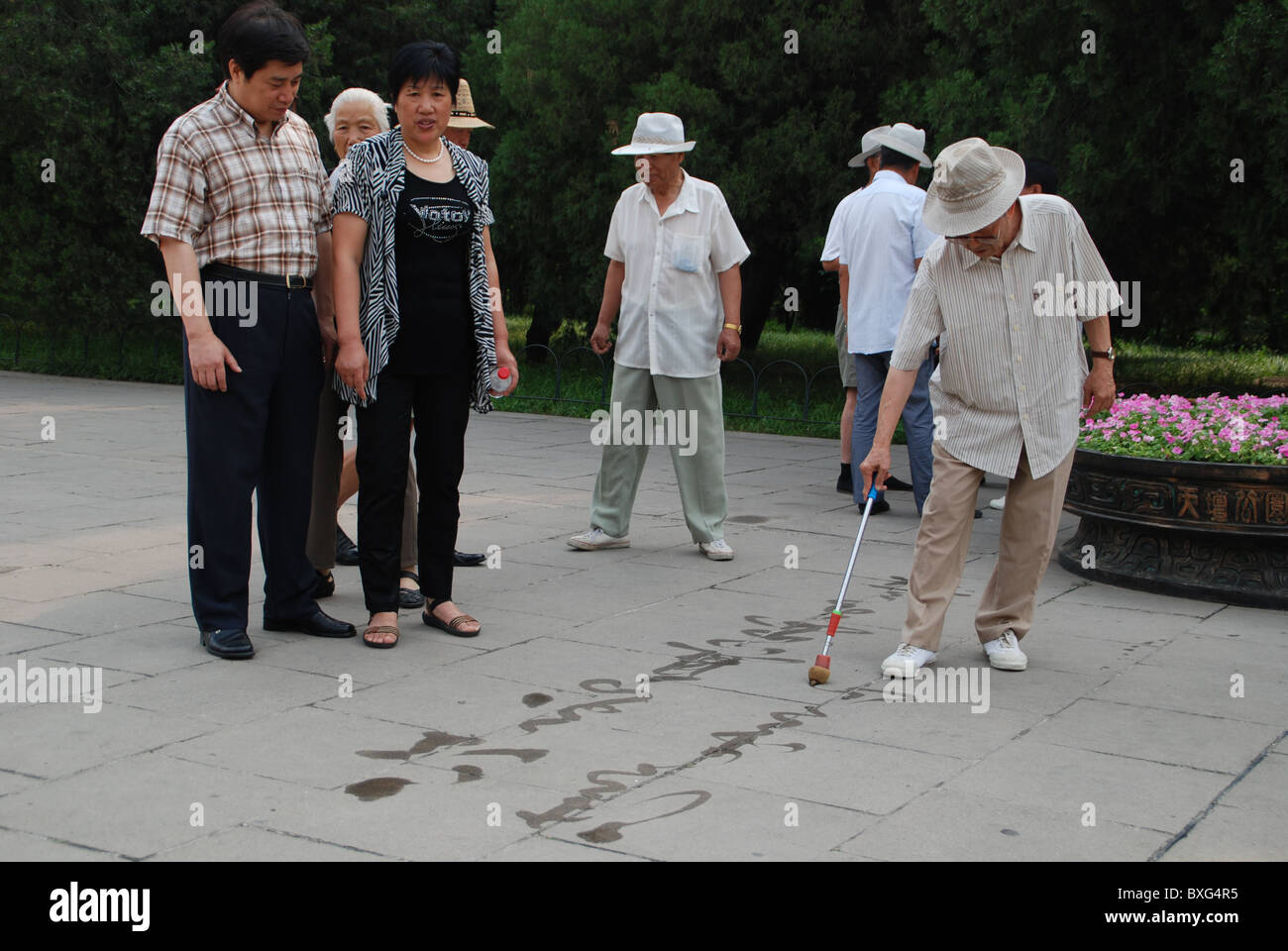 Calligraphy on Pavement, Park, Beijing, China Stock Photo - Alamy