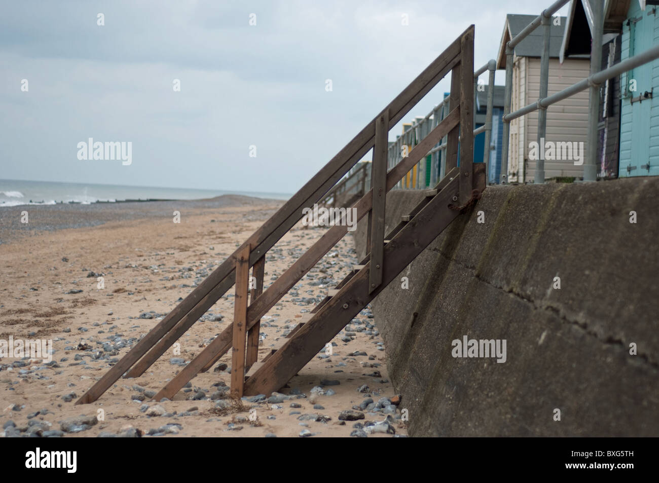 Wooden steps to beach from Huts Stock Photo - Alamy