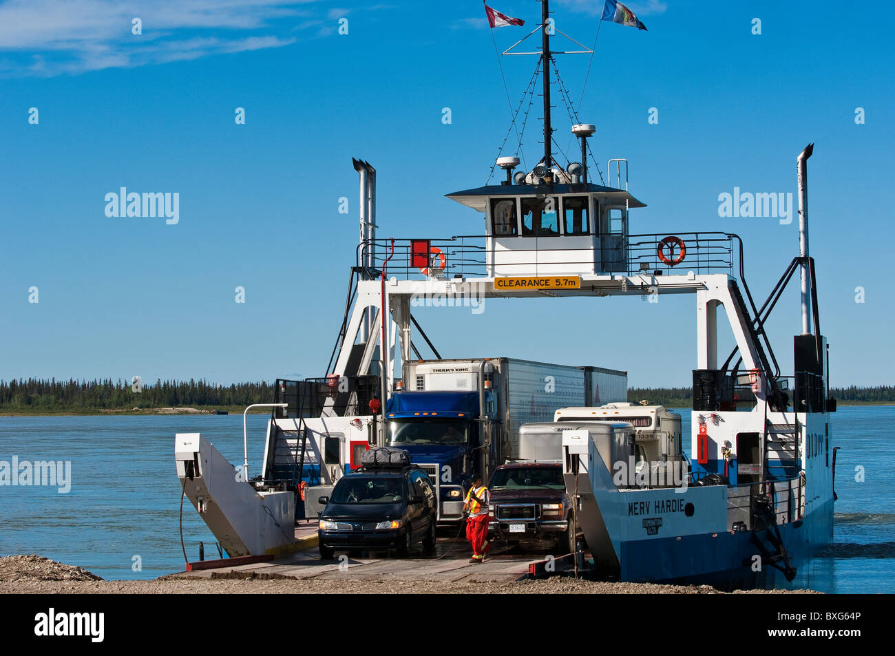 Northwest Territories, Canada. Vehicle ferry across the Mackenzie River ...