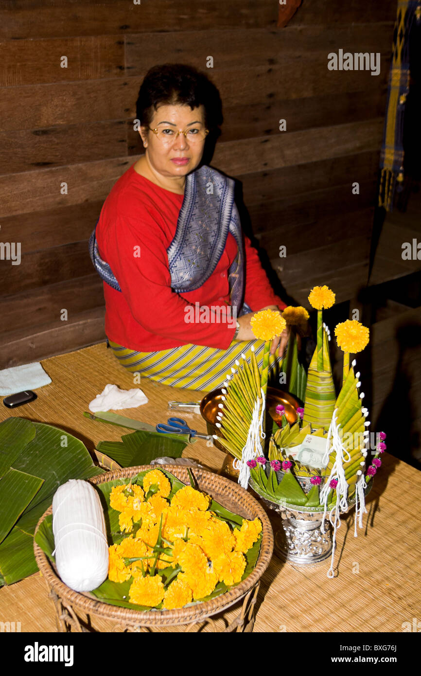 Chiang Rai tribal woman makes flower decorations at Siam Niramit in ...