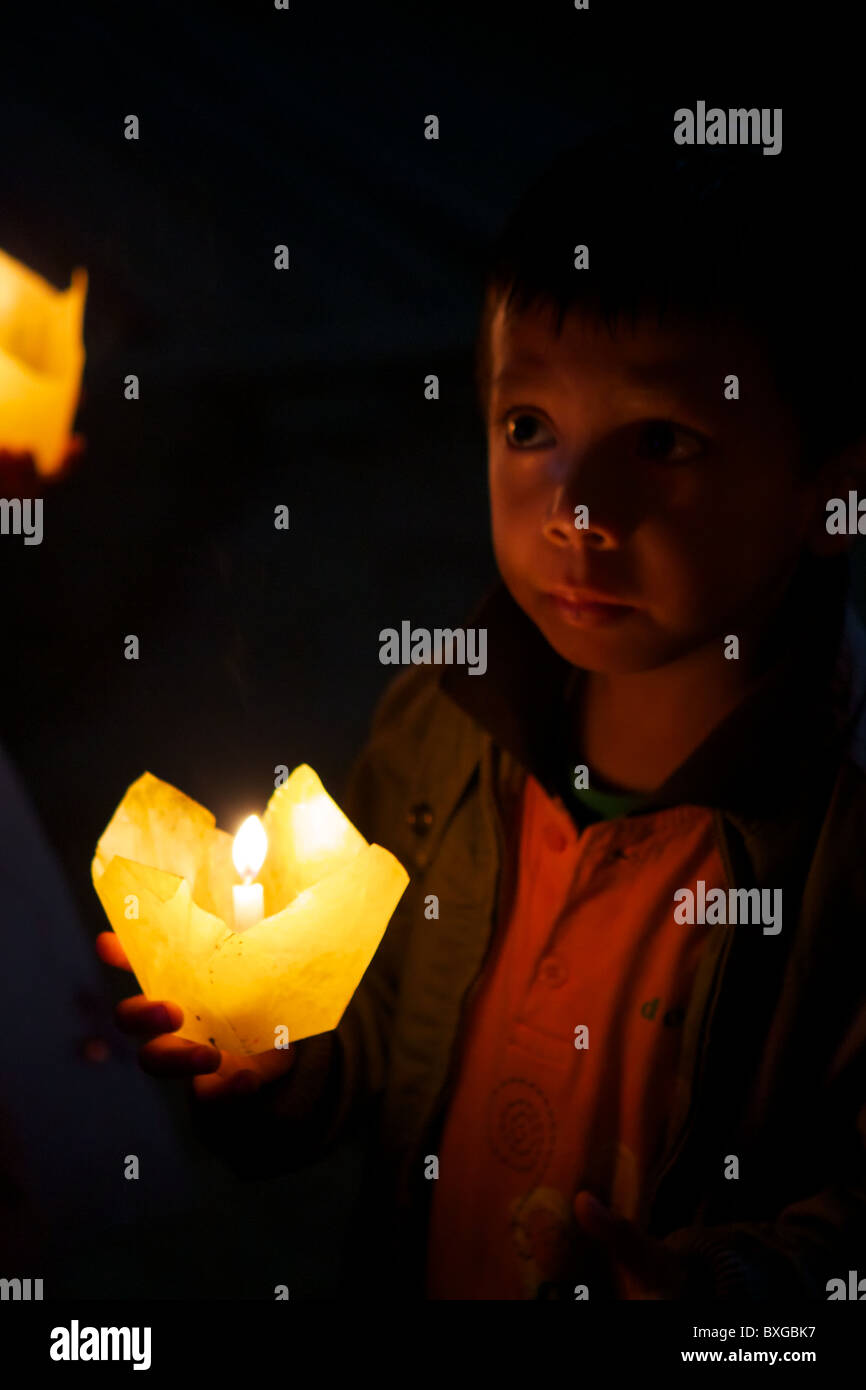 boy with a candle, and light for the myanmar light festival Stock Photo ...