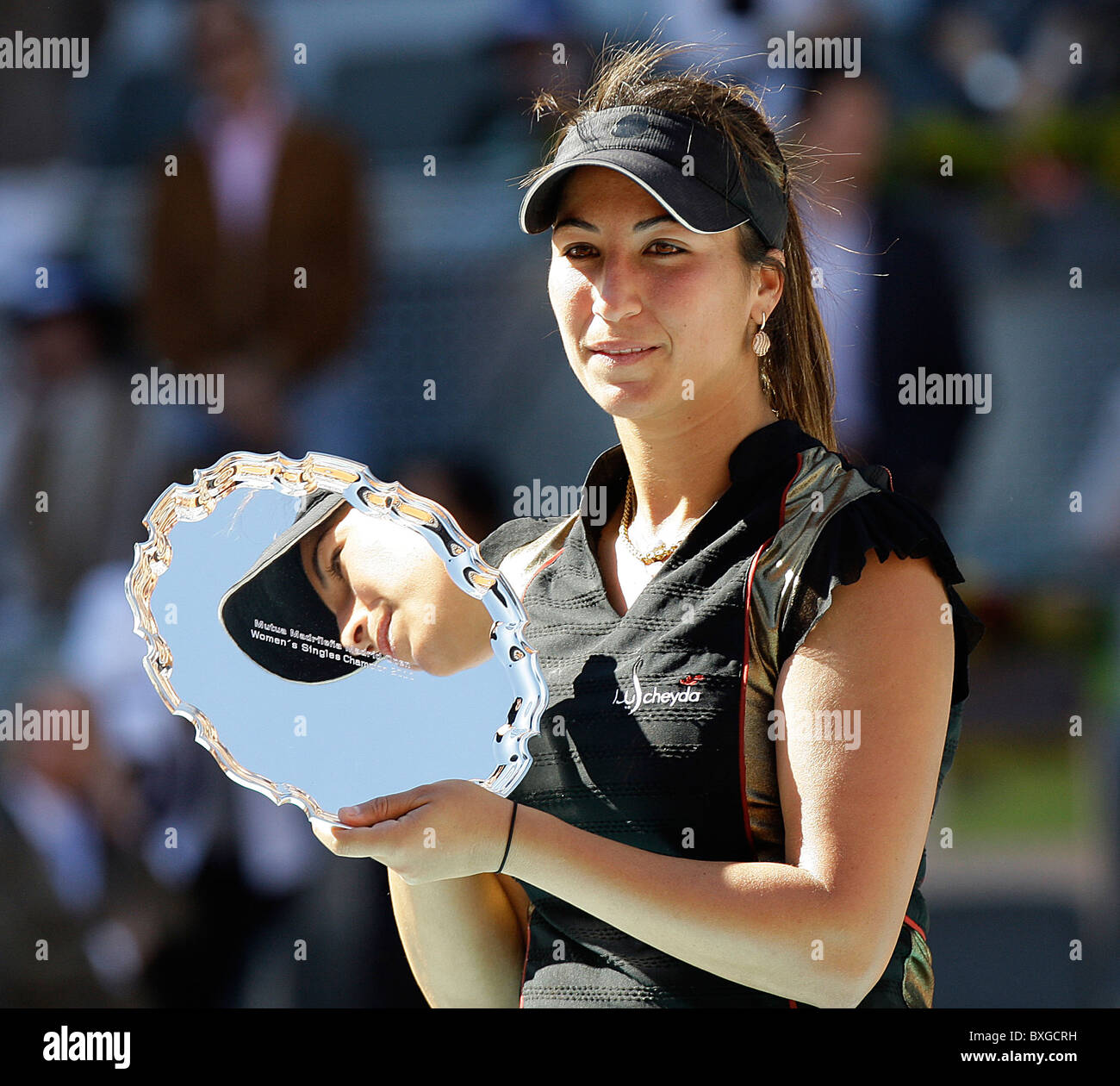 Aravane Rezai (FRA) in action against Venus Williams during the Women's ...
