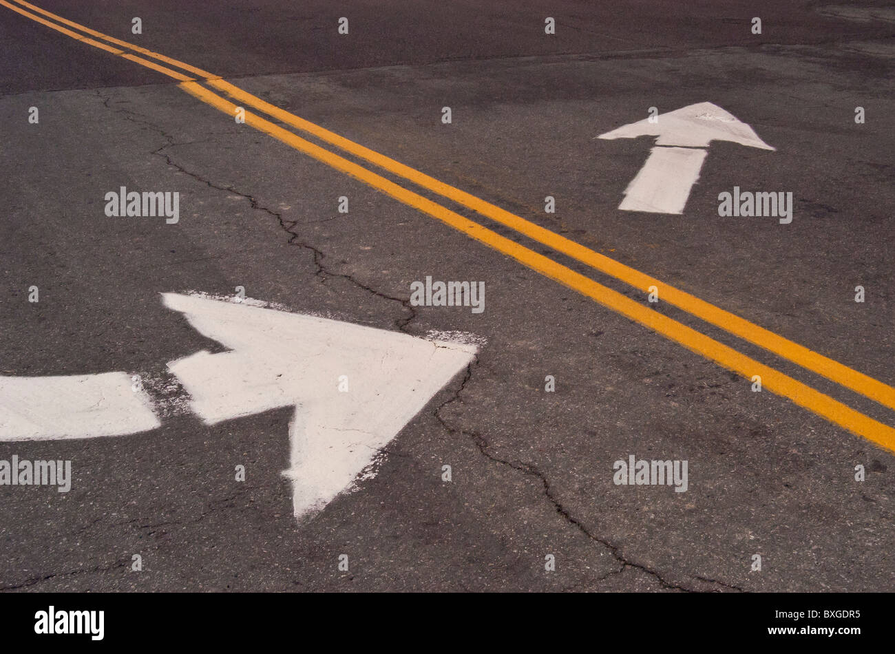 Graphic abstract of directional arrows on a city street in the USA ...