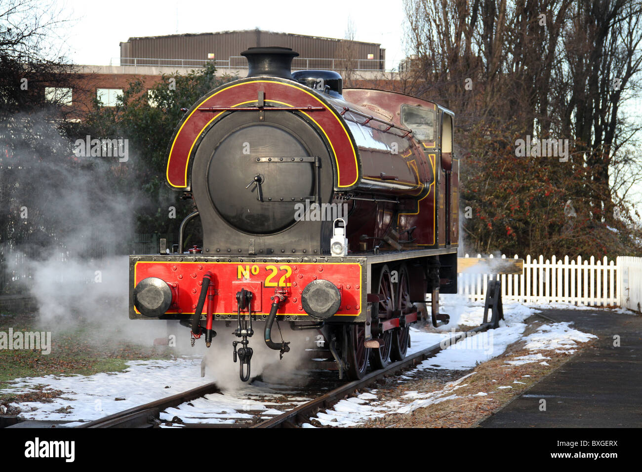 Steam saddle tanker railway engine in cold weather. Hunslet Austerity ...