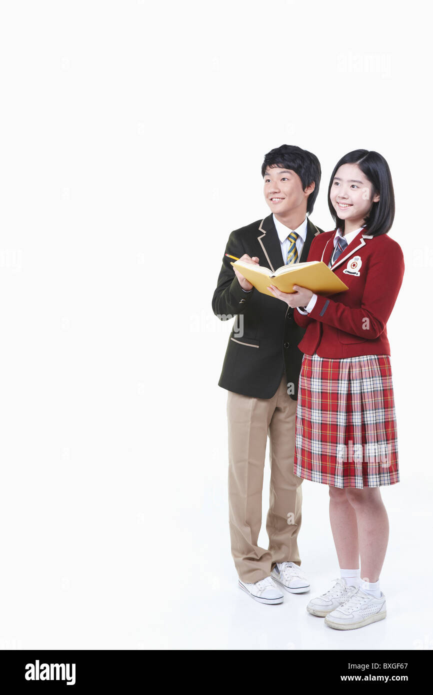 Man reading book woman Cut Out Stock Images & Pictures - Alamy