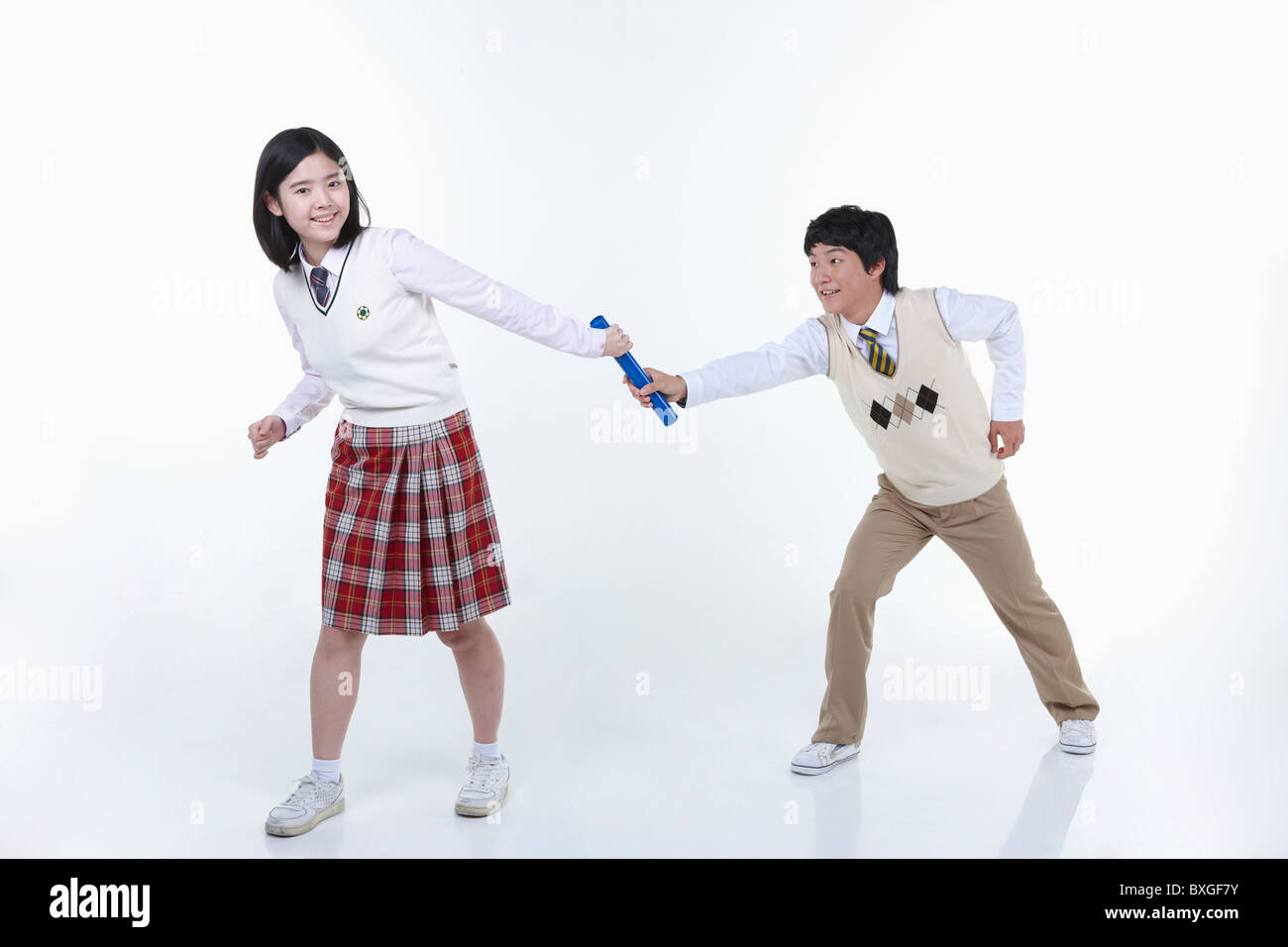 a girl touched the baton Stock Photo - Alamy