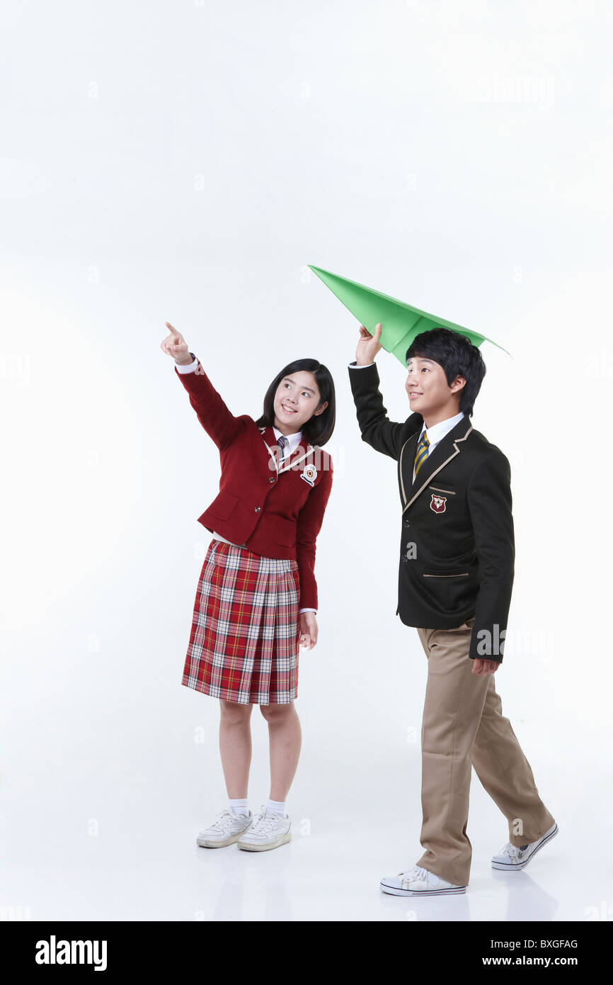 students holding paper airplane Stock Photo - Alamy