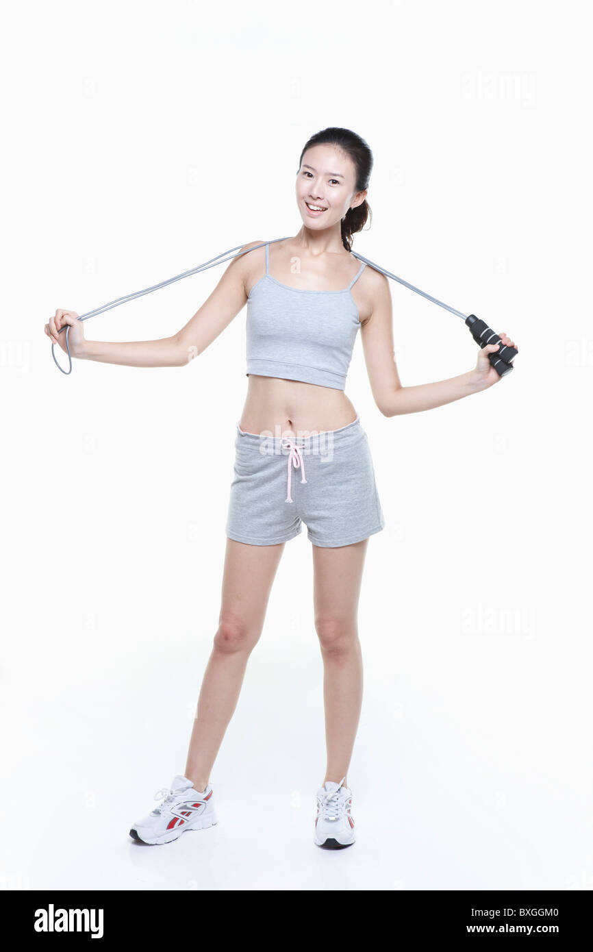 woman is stretching with rope Stock Photo - Alamy