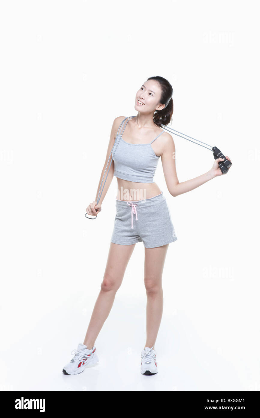 woman is stretching with rope Stock Photo - Alamy