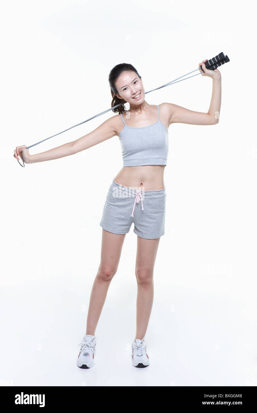 woman is stretching with rope Stock Photo - Alamy