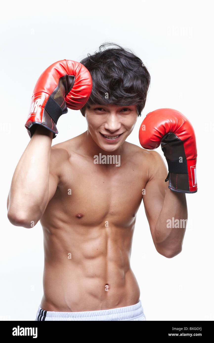 Guy with boxing gloves hi-res stock photography and images - Alamy