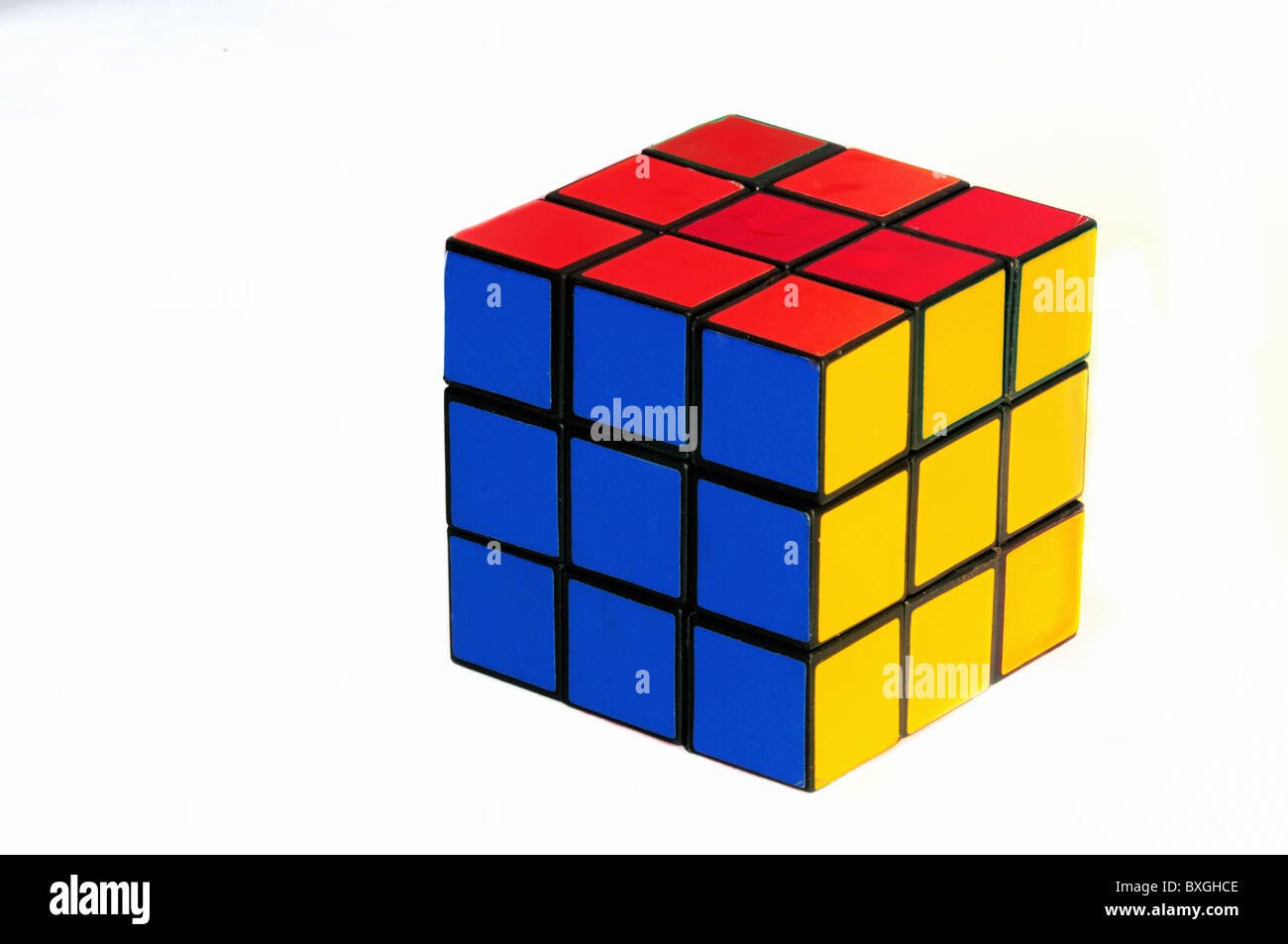 A colored cube isolated on white background Stock Photo - Alamy