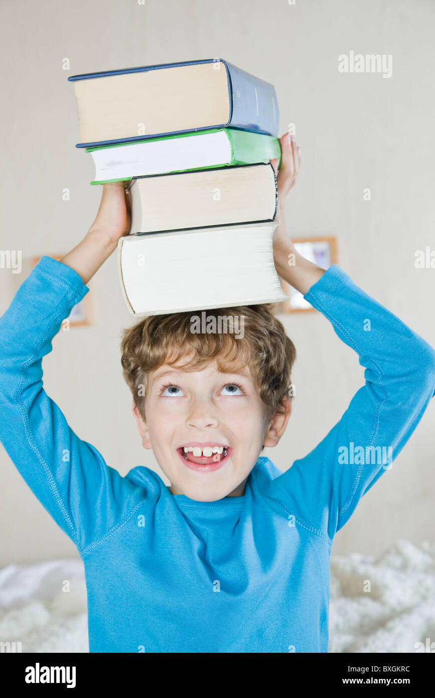 Boy with books Stock Photo - Alamy