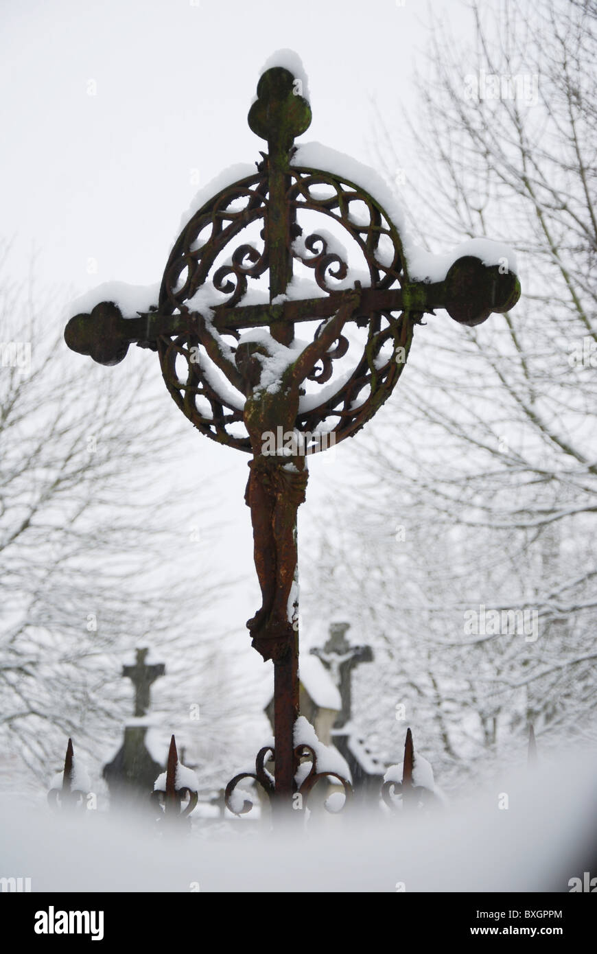 snow-covered cross at Het Oude Kerkhof in Roermond Netherlands Europe ...