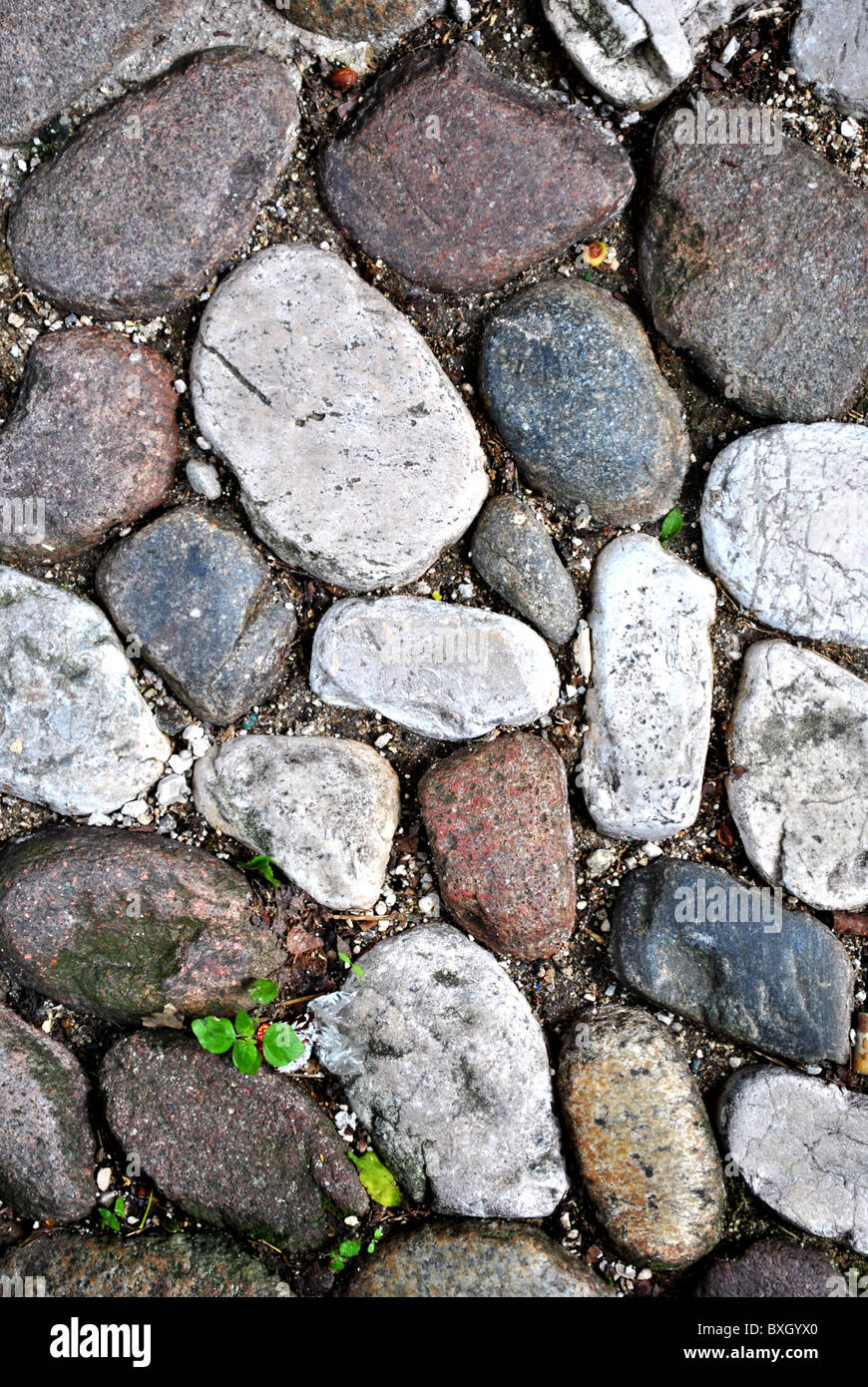round river stones used for paving roads in typical areas of the ...