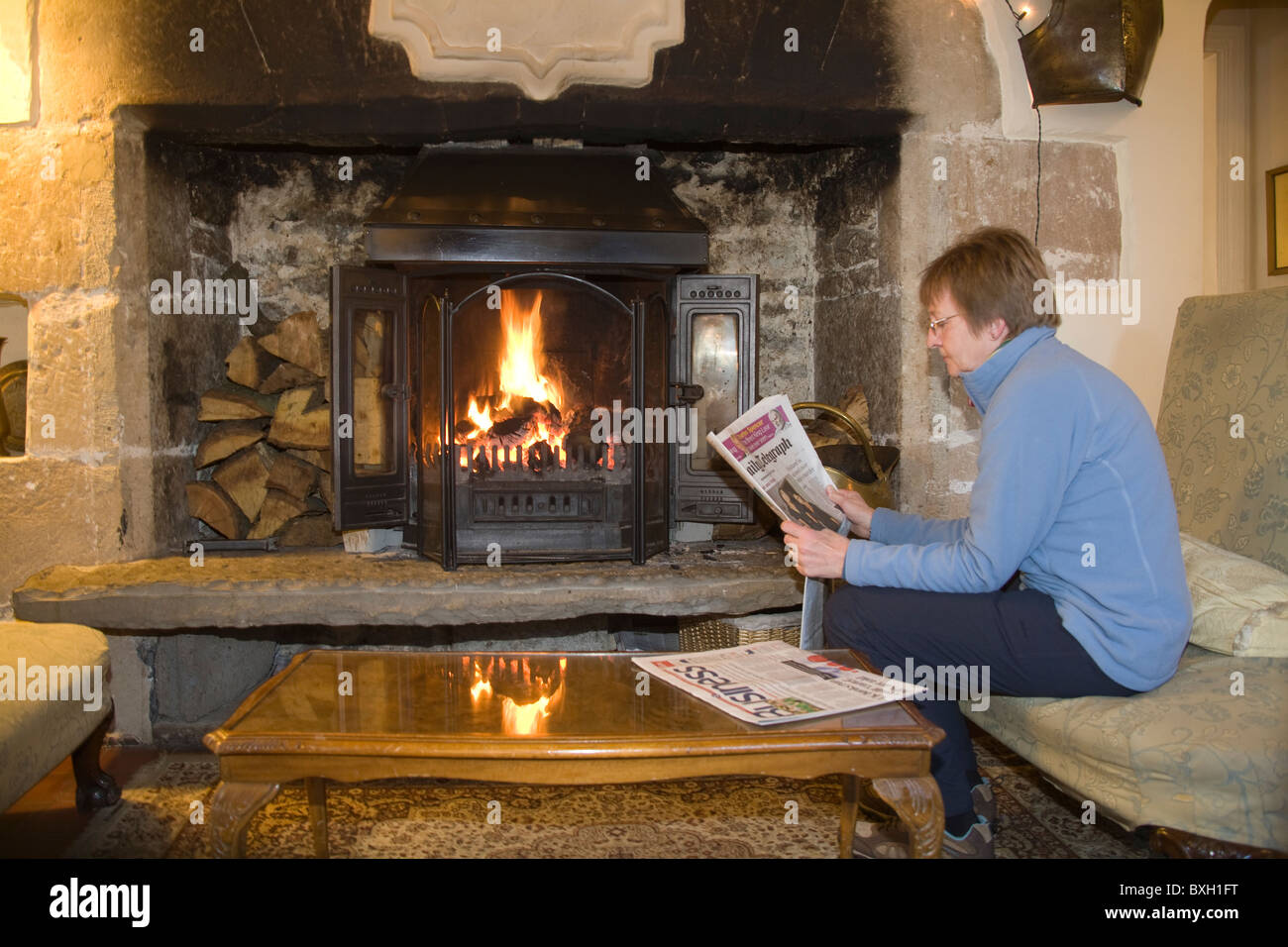 Woman Reading In Front Fire High Resolution Stock Photography and ...