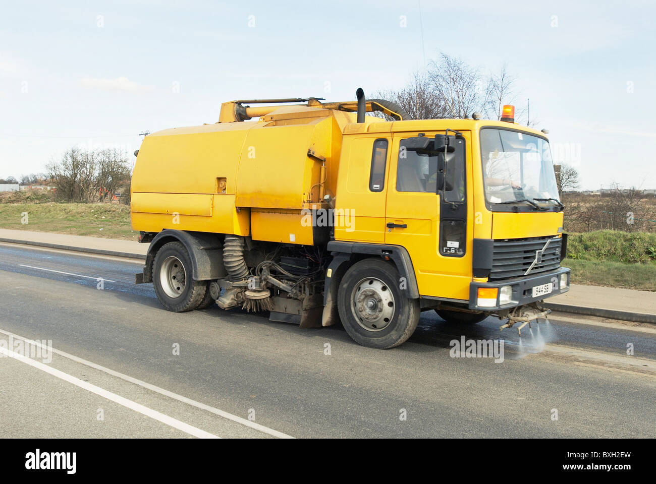Road sweeper lorry Stock Photo - Alamy