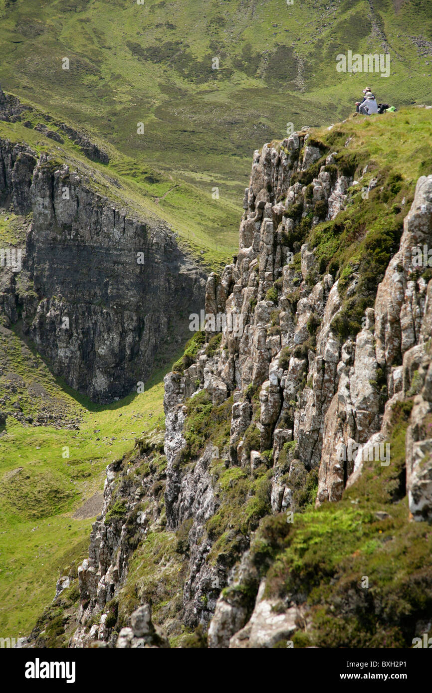 Walkers resting near the top of Sronn Vourlinn near the Quiraing, Isle ...