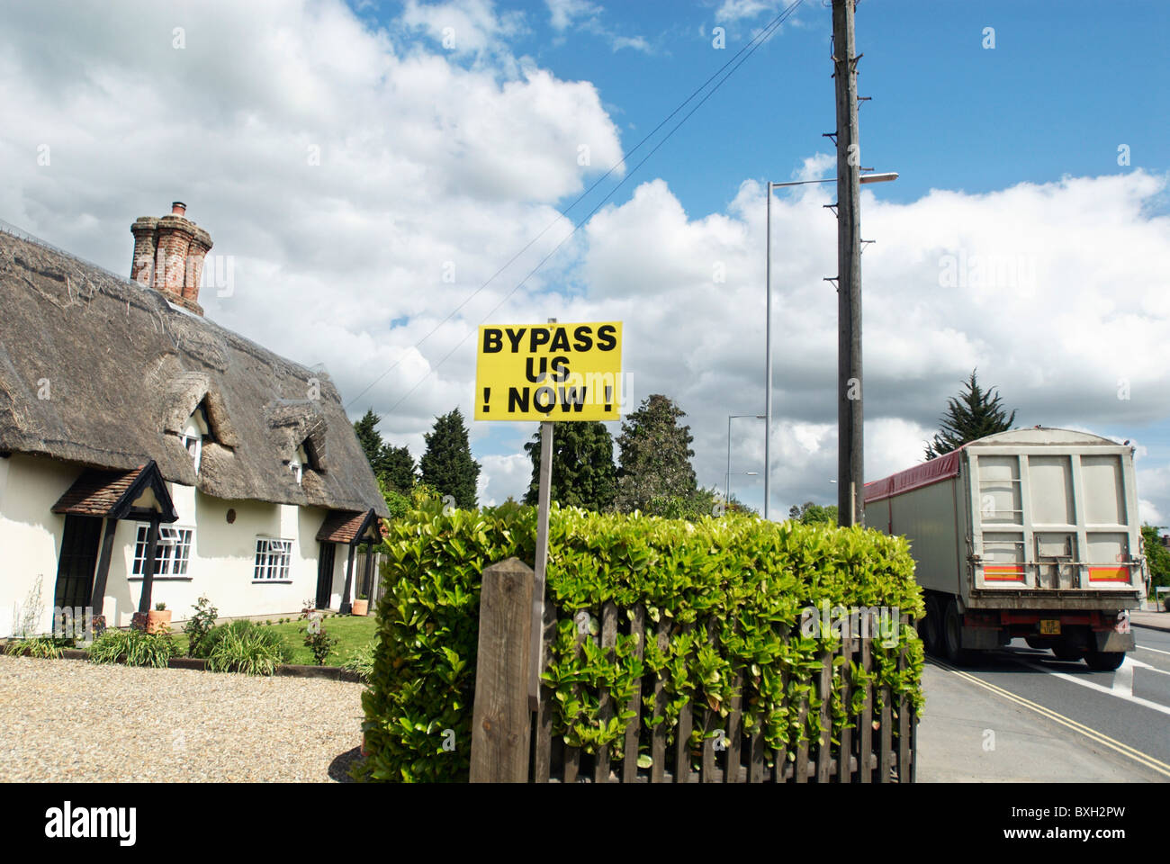 Road bypass' campaign signs in a village on the A140 route between ...