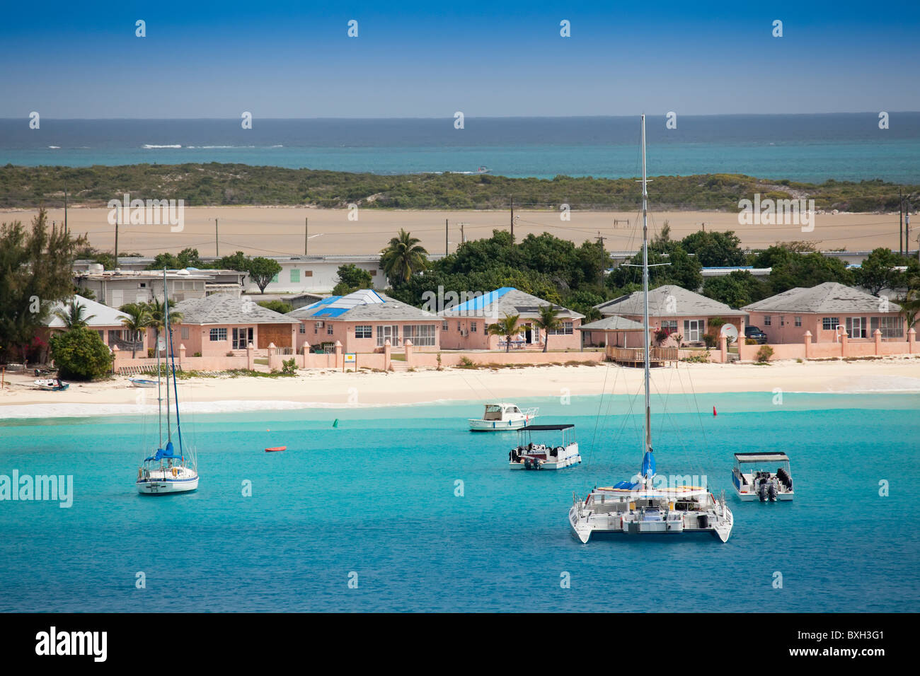 Small beach houses in Grand Turk Caicos Islands Stock Photo - Alamy