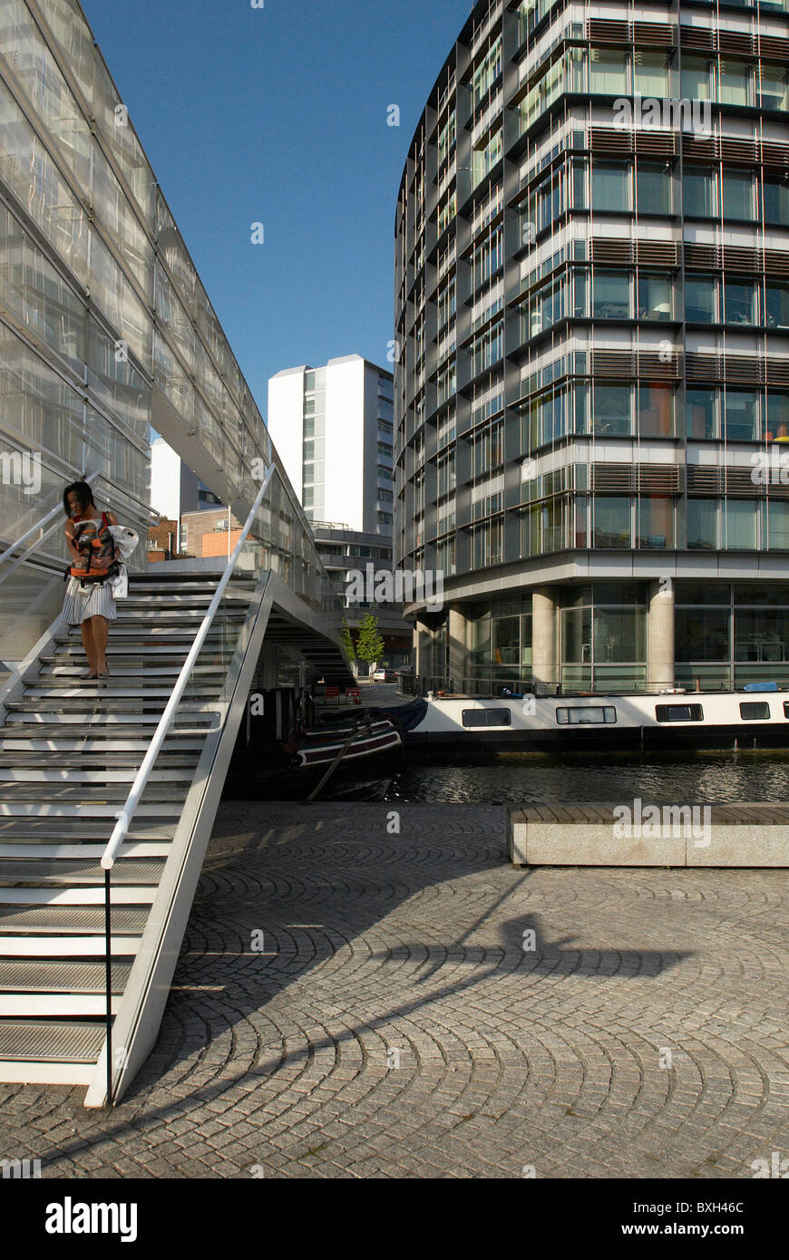 A footbridge crossing near 'The Point' at Paddington Basin designed by ...