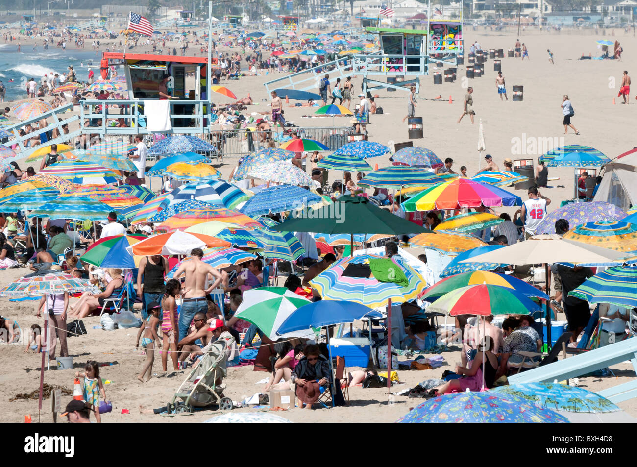 Colorful umbrellas on crowded beach in Santa Monica, California Stock ...