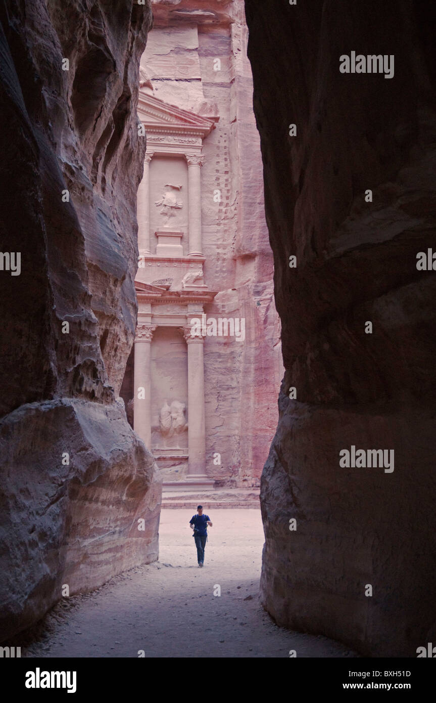 classic view through the Siq of the Treasury in Petra, the UNESCO World ...