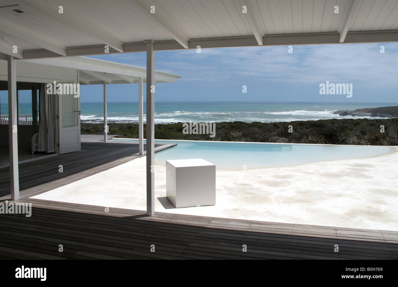 View from veranda and infinitely pool overlooking the sea Stock Photo ...