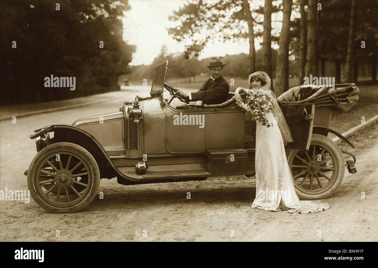 people, couples, wedding, engaged couple with car, driving into ...