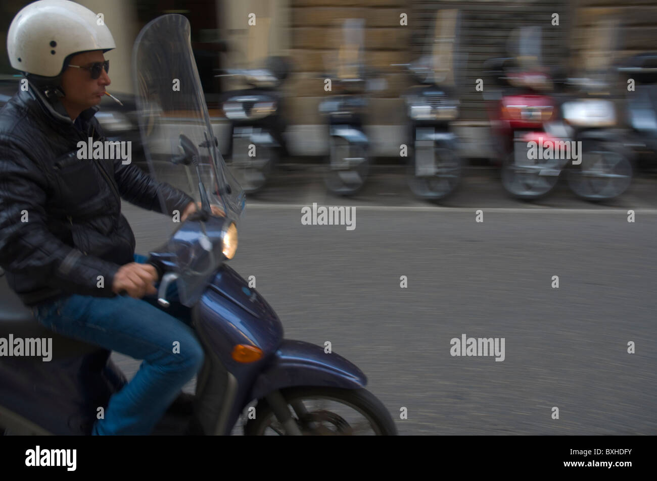 Italian man smoking a cigarette in florence hi-res stock photography ...